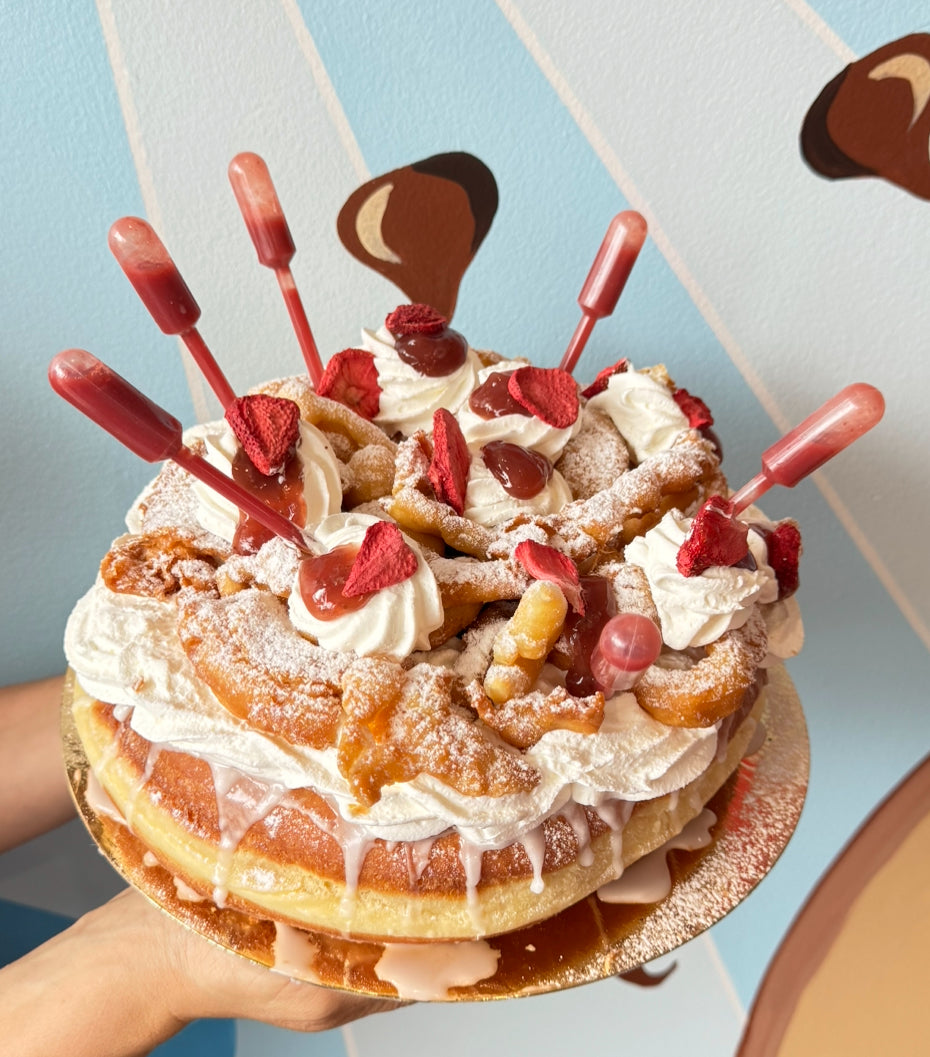 Strawberry funnel cake donut cake – The Rolling Pin Bakery Toronto